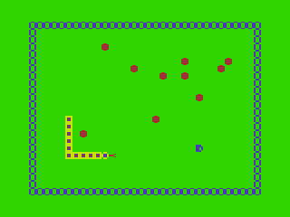 Screenshot of Sneaky Snake (TRS-80 CoCo, 1987) - MobyGames
